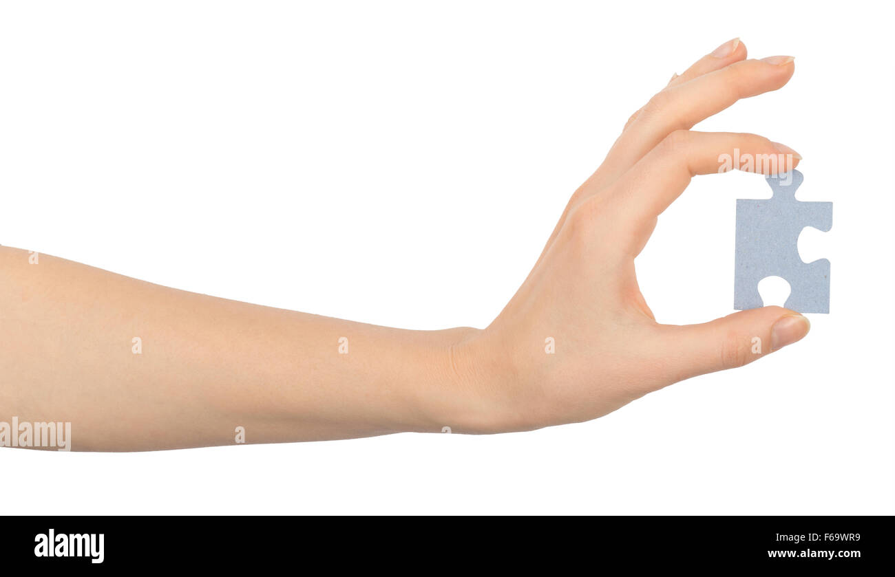 Hand holding puzzle piece Stock Photo - Alamy