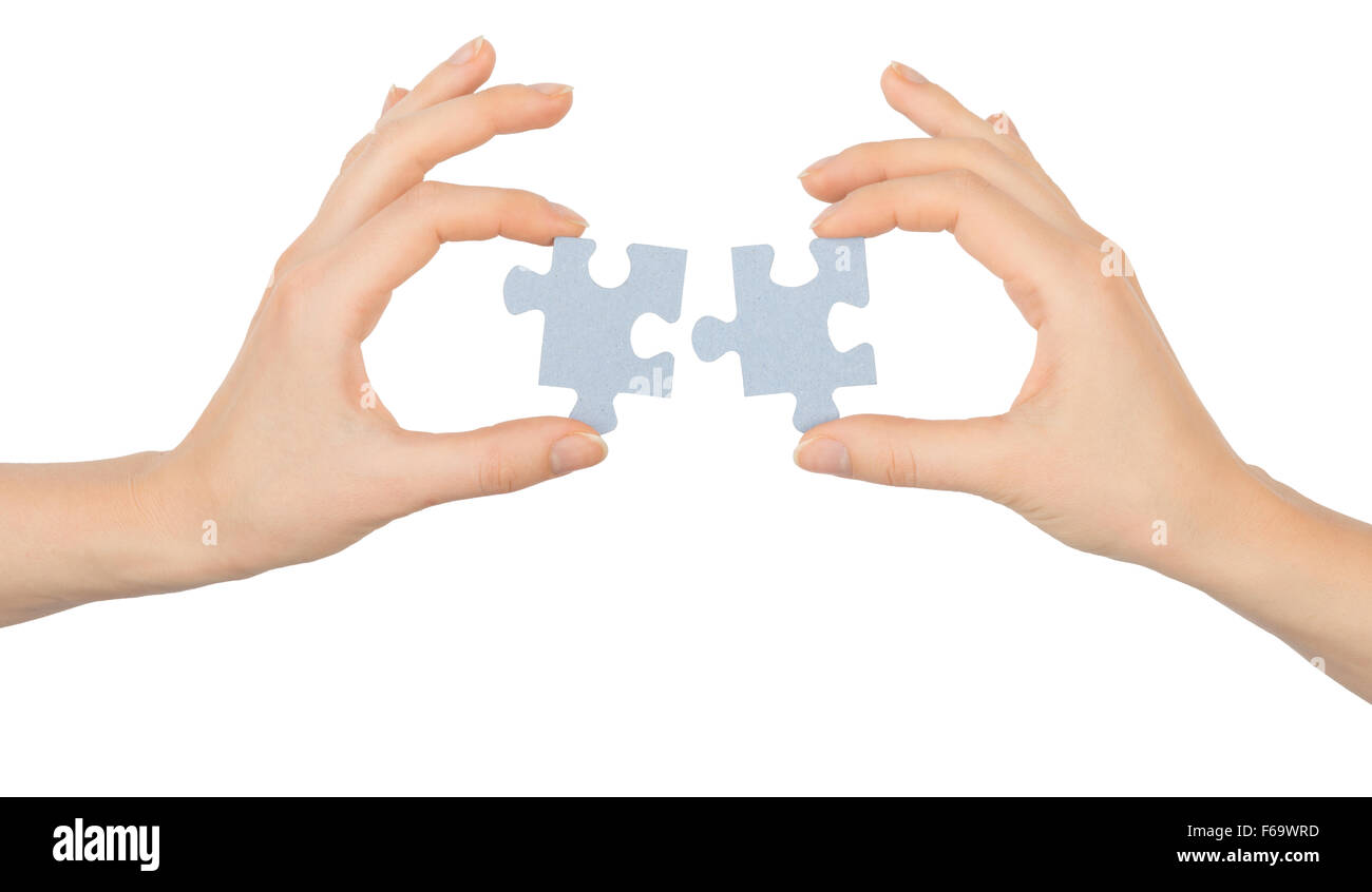 Hands holding puzzle pieces Stock Photo - Alamy Hands holding puzzle pieces Stock Photo - Alamy