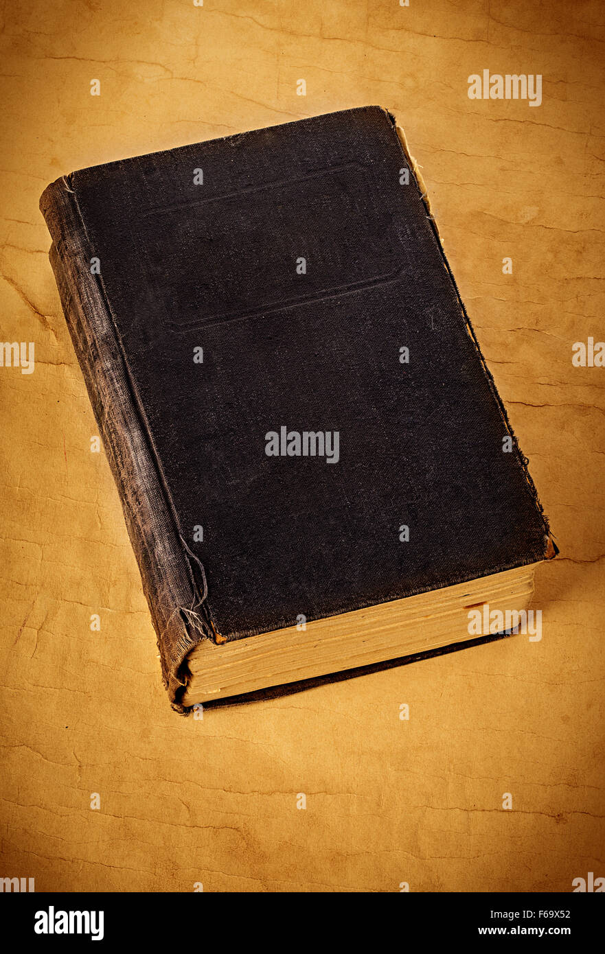 Old grunge book close-up on a vintage background Stock Photo - Alamy