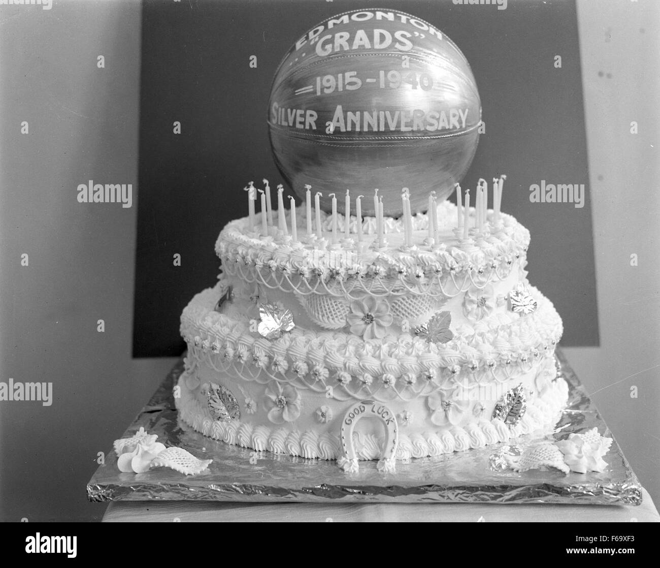 Photograph of a 25th-anniversary cake celebrating the Commercial Grads ...