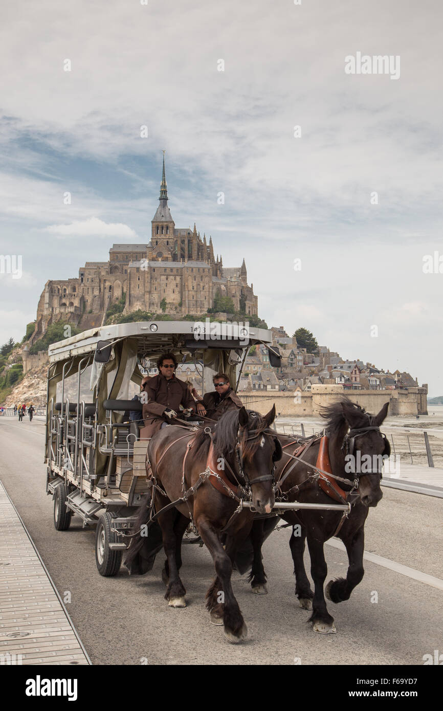Horse and carriage at Mont Saint-Michel island commune at the mouth of ...