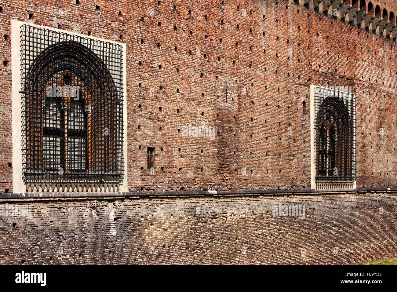 castle old brown brick and window in the grass of castle sforzesco ...
