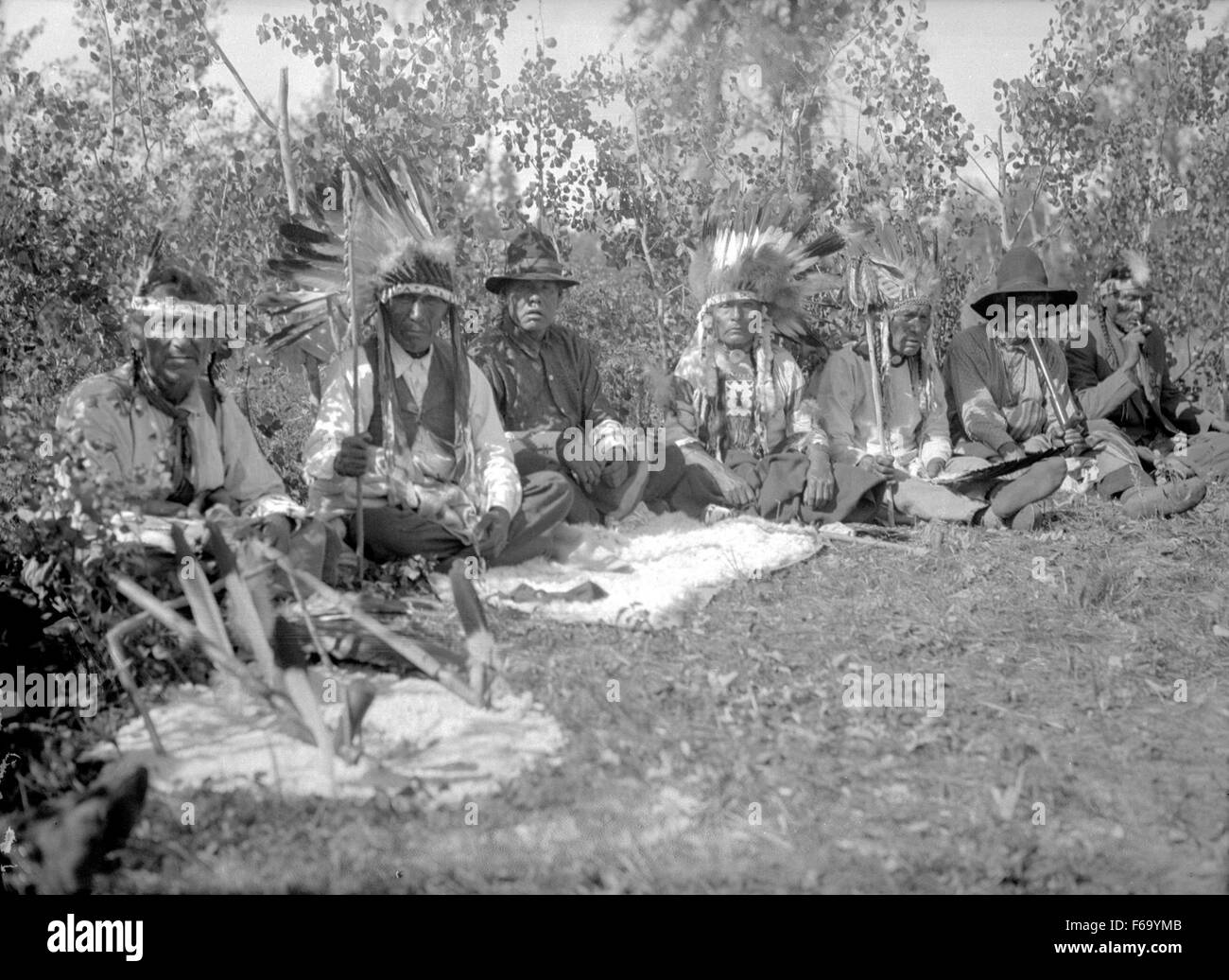 This image shows Cree and Métis men performing a traditional Pipe ...
