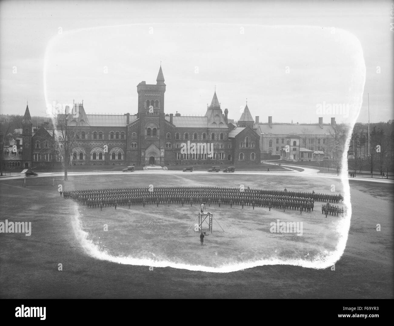 A military unit is captured in a circular, panoramic Cirkut photograph ...