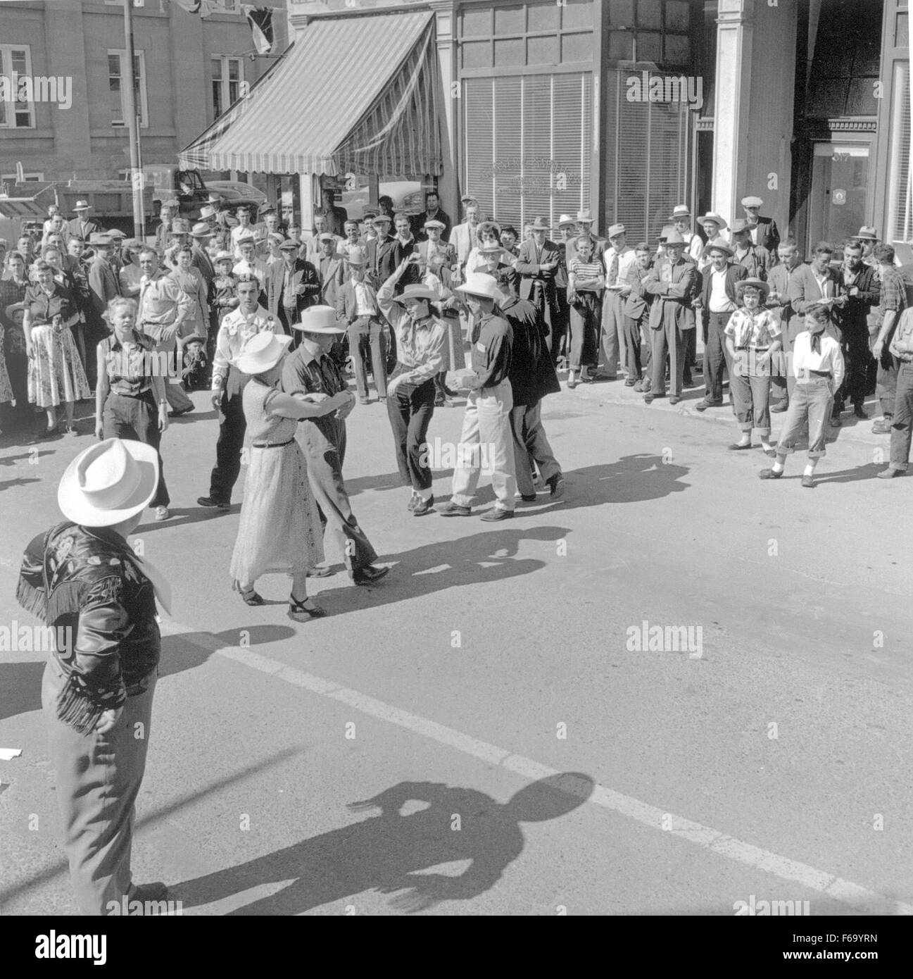 A lively street scene showing people dancing, likely from a public ...