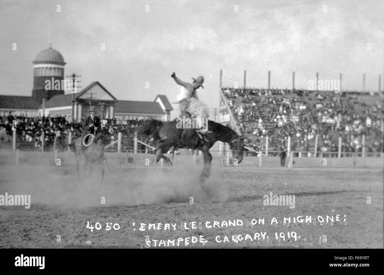 A photograph of Emery Le Grand performing a daring stunt, likely ...