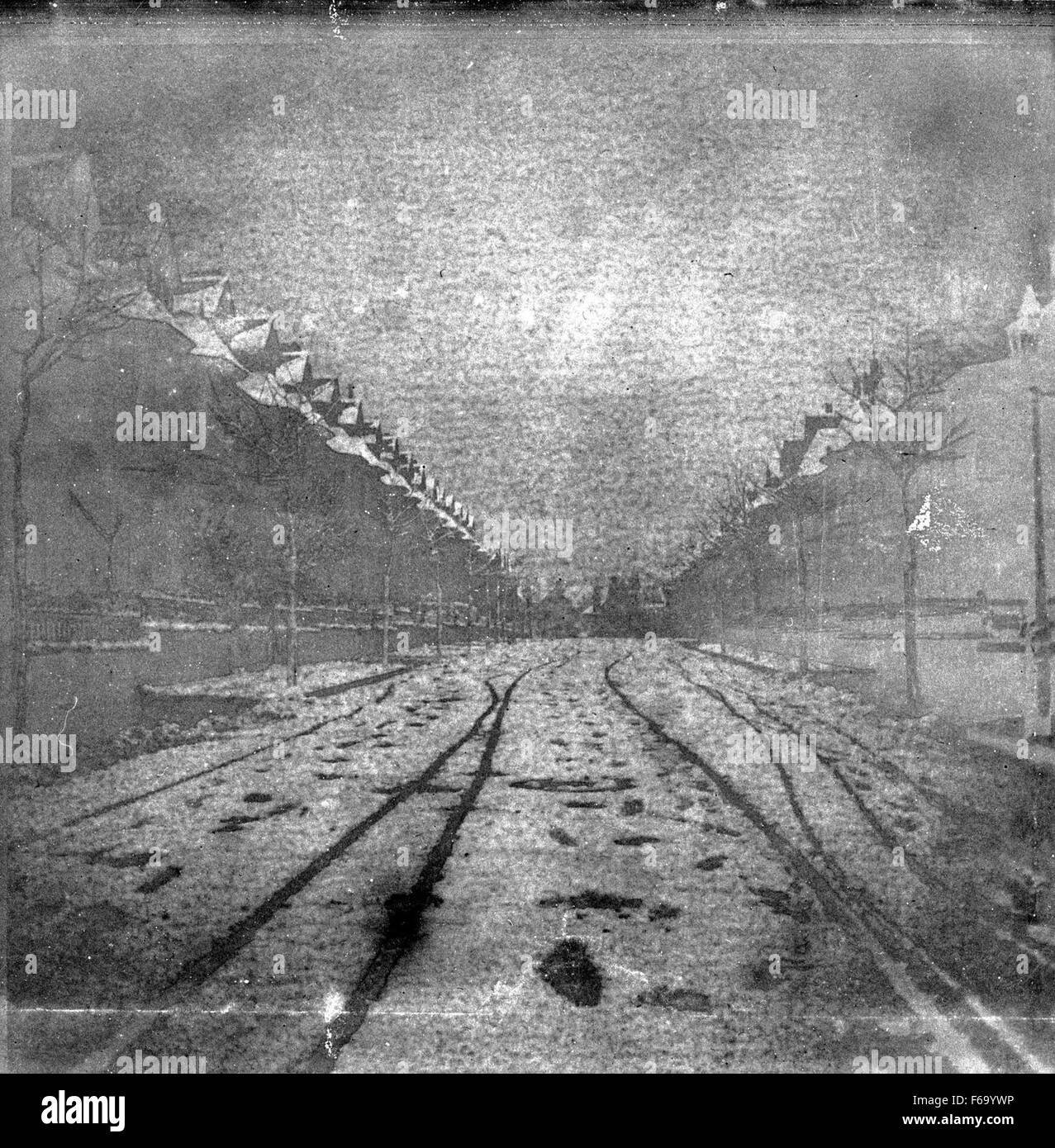 A winter street scene showcasing a snow-covered street in an ...