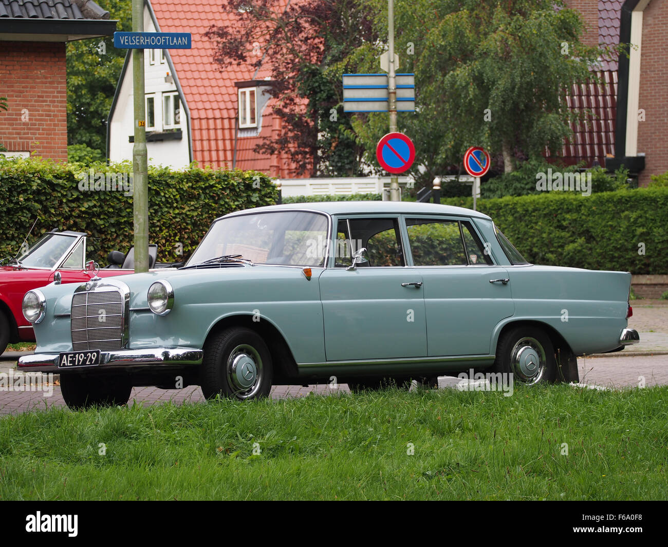 A Mercedes-Benz 190C, captured in the first image, showcasing the ...