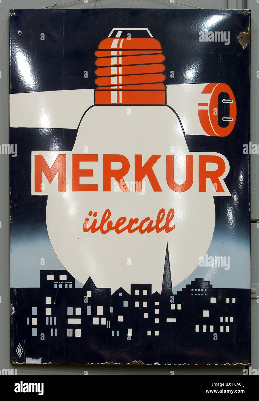 Antique Merkur enamel advertising sign featuring colorful graphics ...