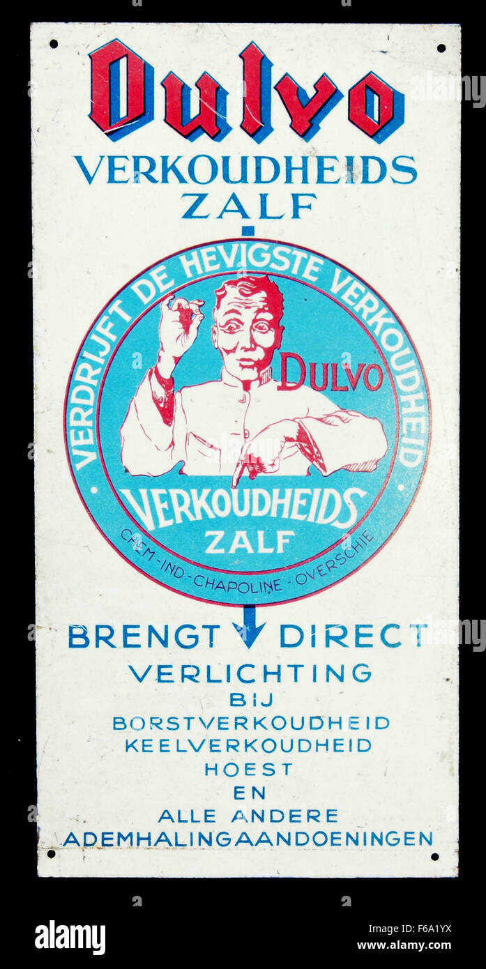 An old cardboard advertising sign for Oulvo Verkoudheids Zalf ...