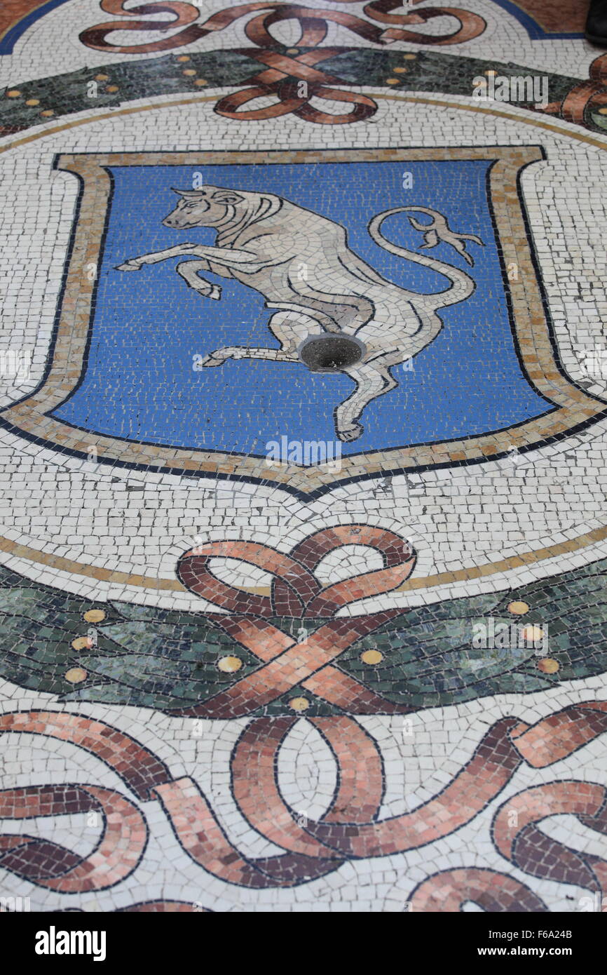 SPINNING ON THE BULL FOR GOOD LUCK - MILAN, ITALY Galleria Vittorio ...