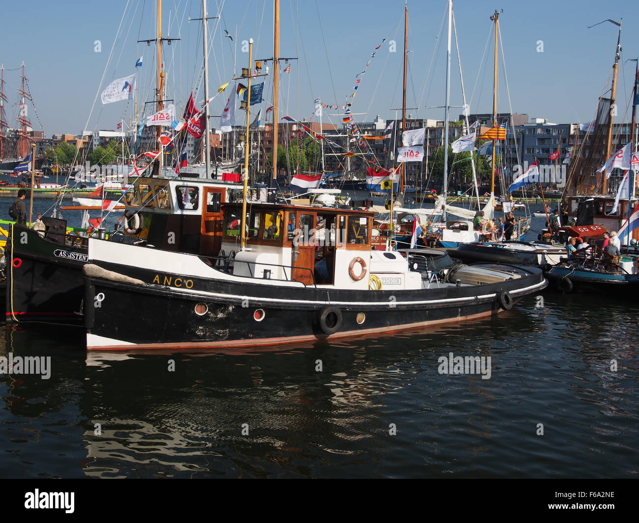 SAIL Amsterdam, Anco (tugboat, 1911), supports container and oil tanker ...