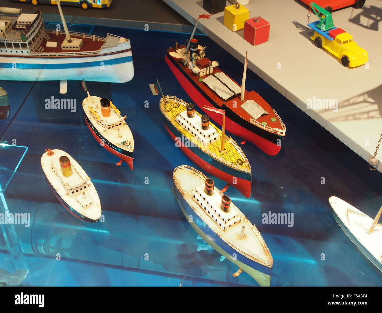 A collection of wind-up tin toy ships from the Speelgoedmuseum Deventer ...