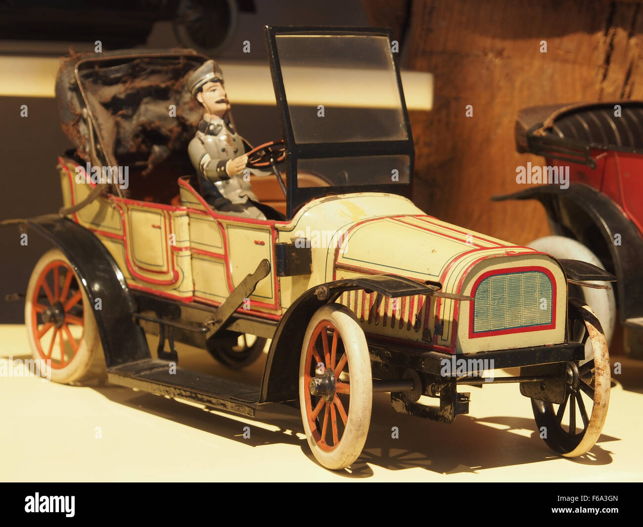 A tin toy car displayed at the Speelgoedmuseum Deventer, offering a ...