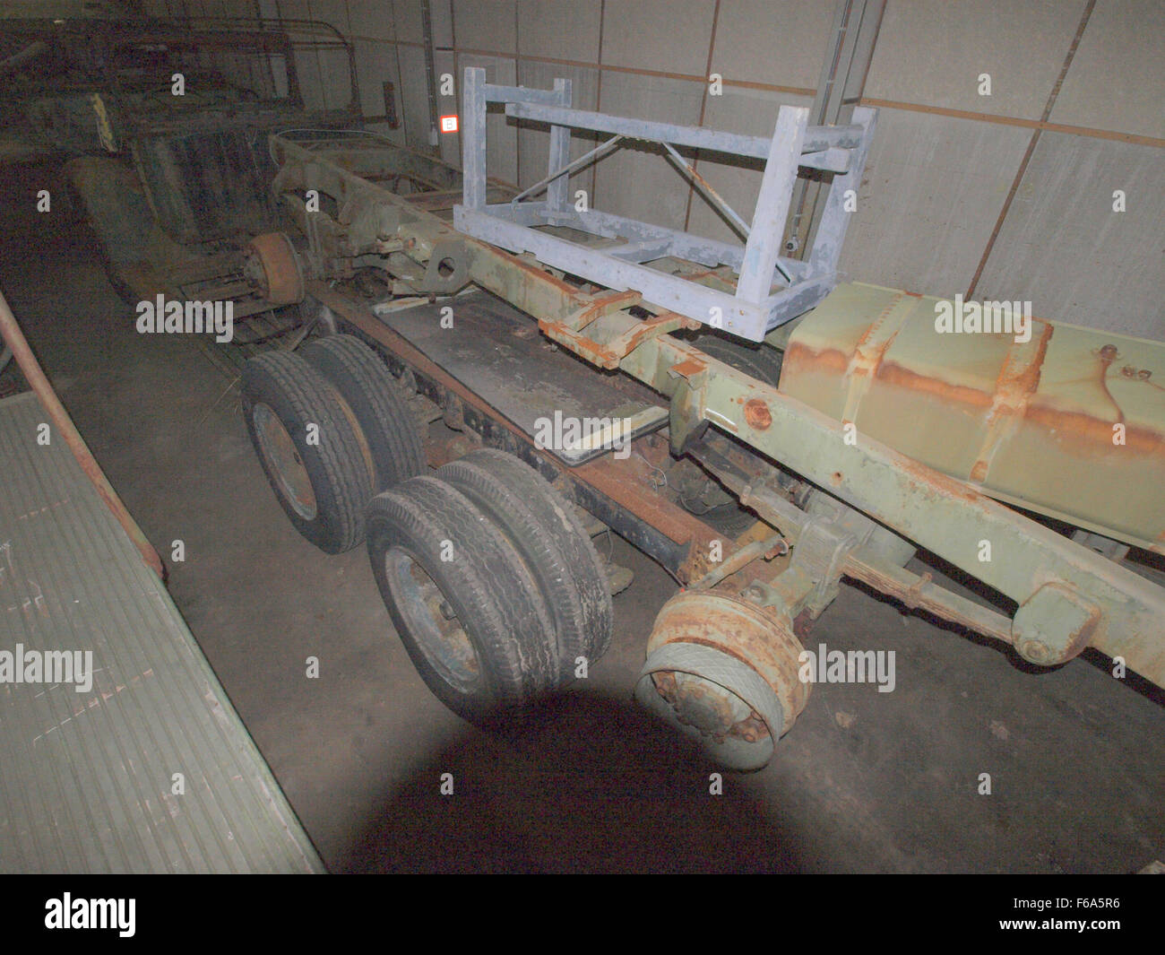 The chassis of a military truck is seen at Maaldrift, likely indicating ...