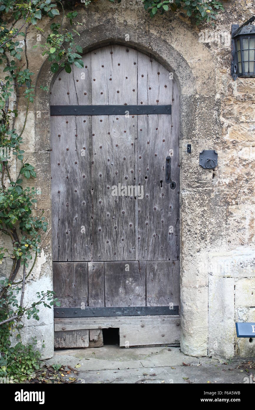 Medieval doorway and studded door Stock Photo - Alamy