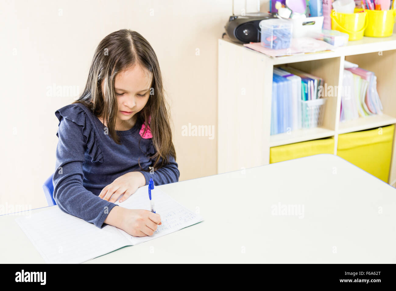 Class writing hi-res stock photography and images - Alamy