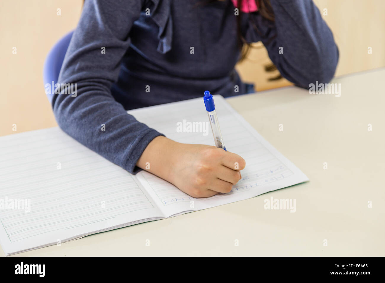 Class writing hi-res stock photography and images - Alamy
