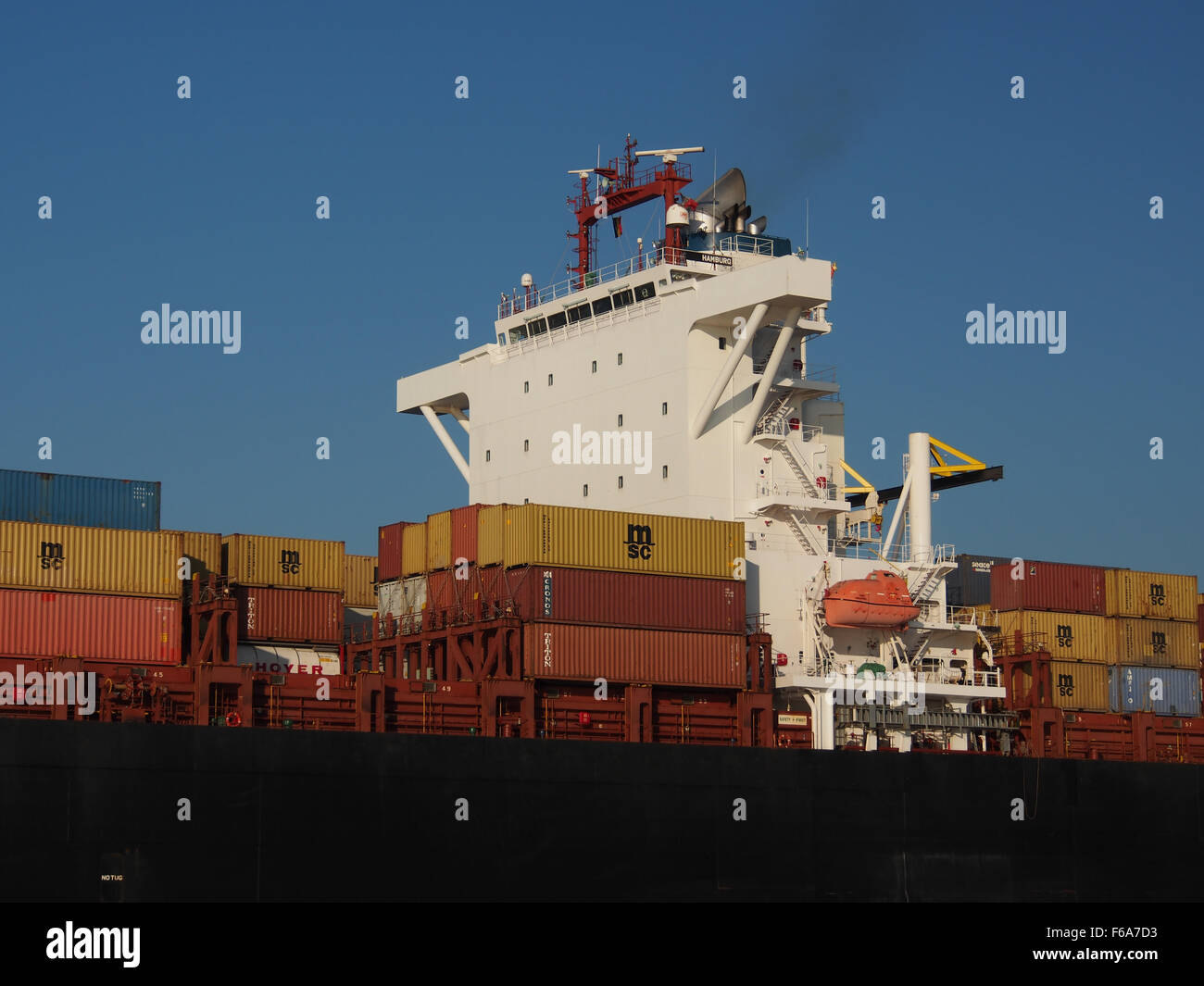 The Hamburg container ship, identified by its IMO number 9332860, is ...