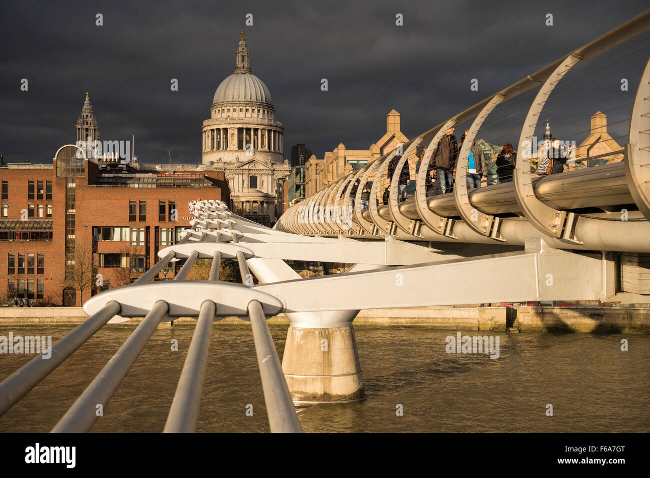An unusual viewpoint of the Millennium footbridge over the River Thames ...