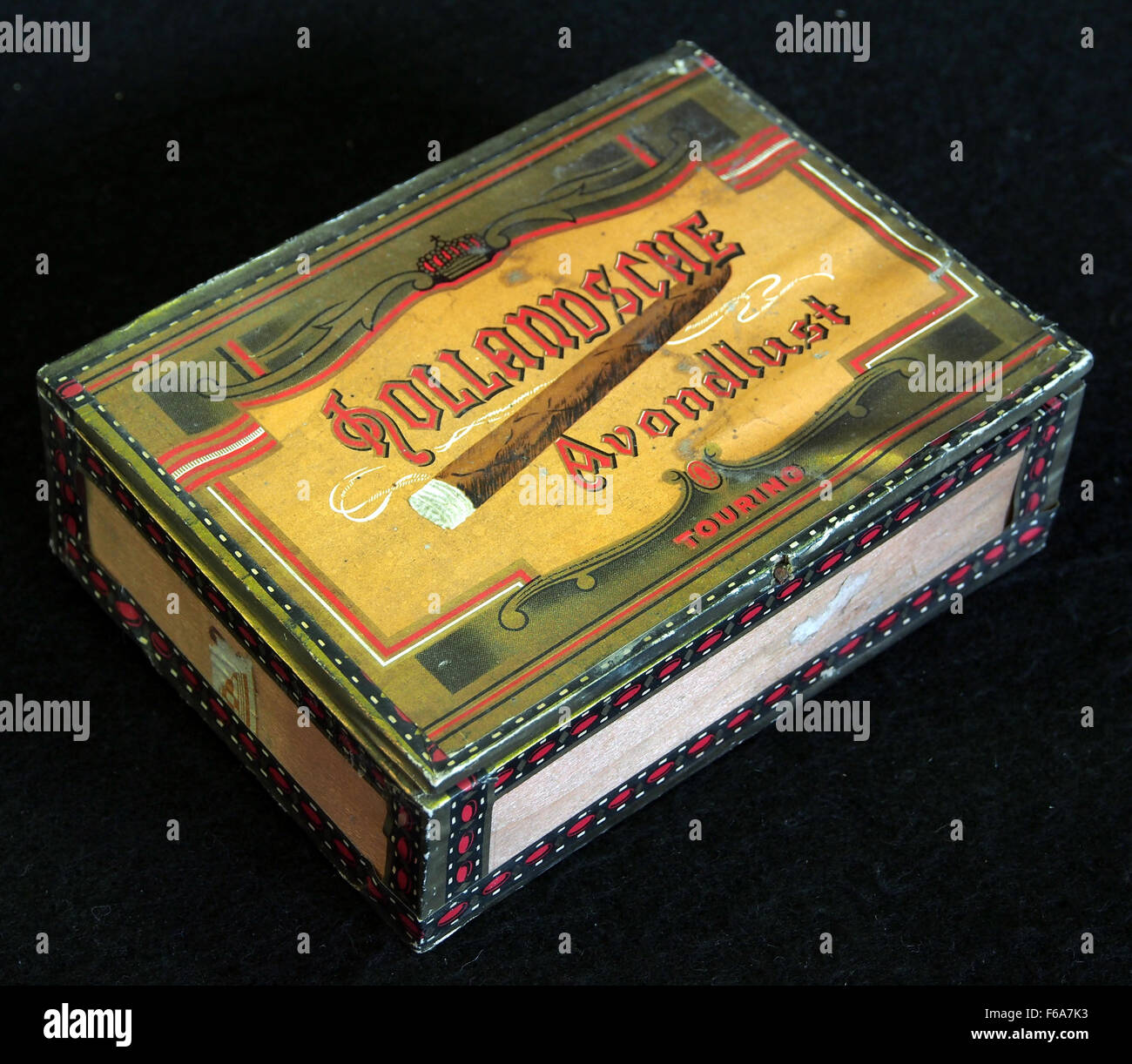 A vintage Hollandsche Avondlust cigar box, showcasing the intricate ...