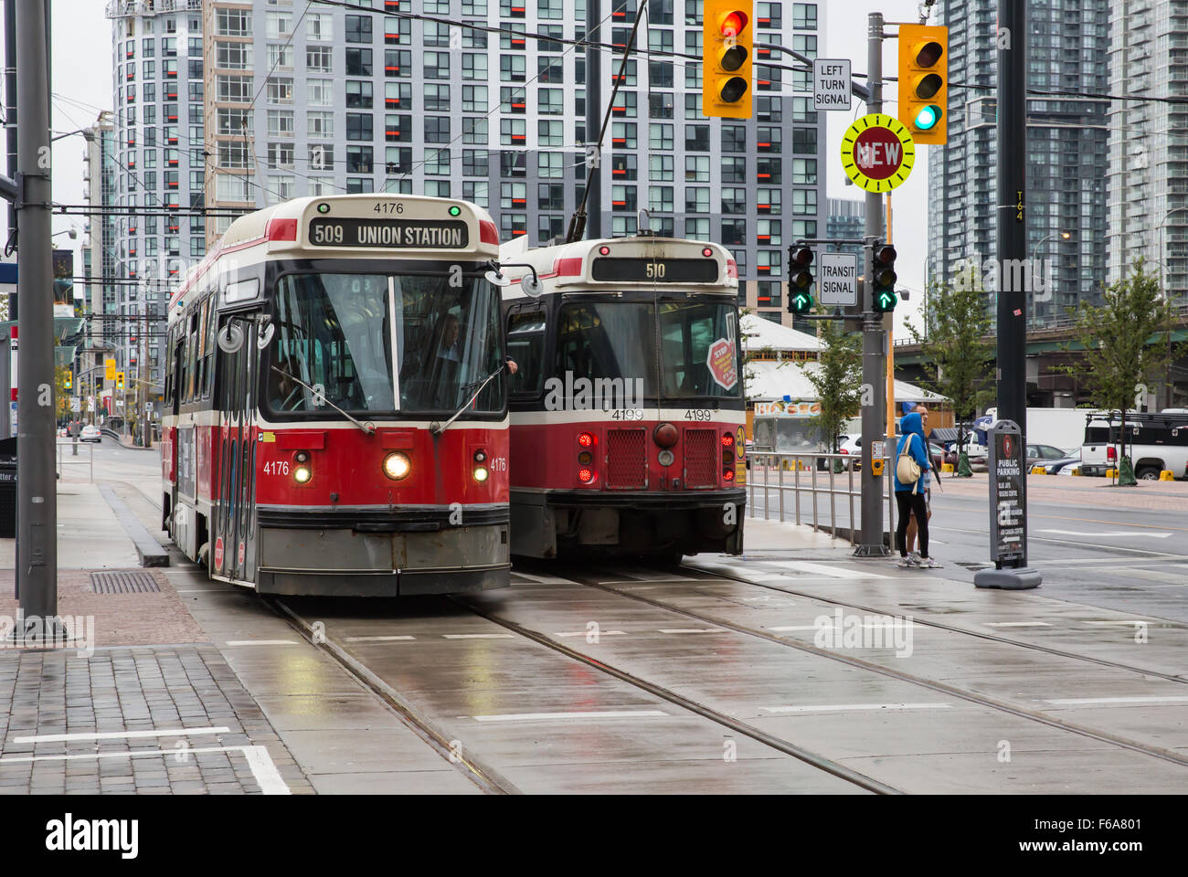 Toronto Streetcars running along the tram lines in downtown Toronto ...