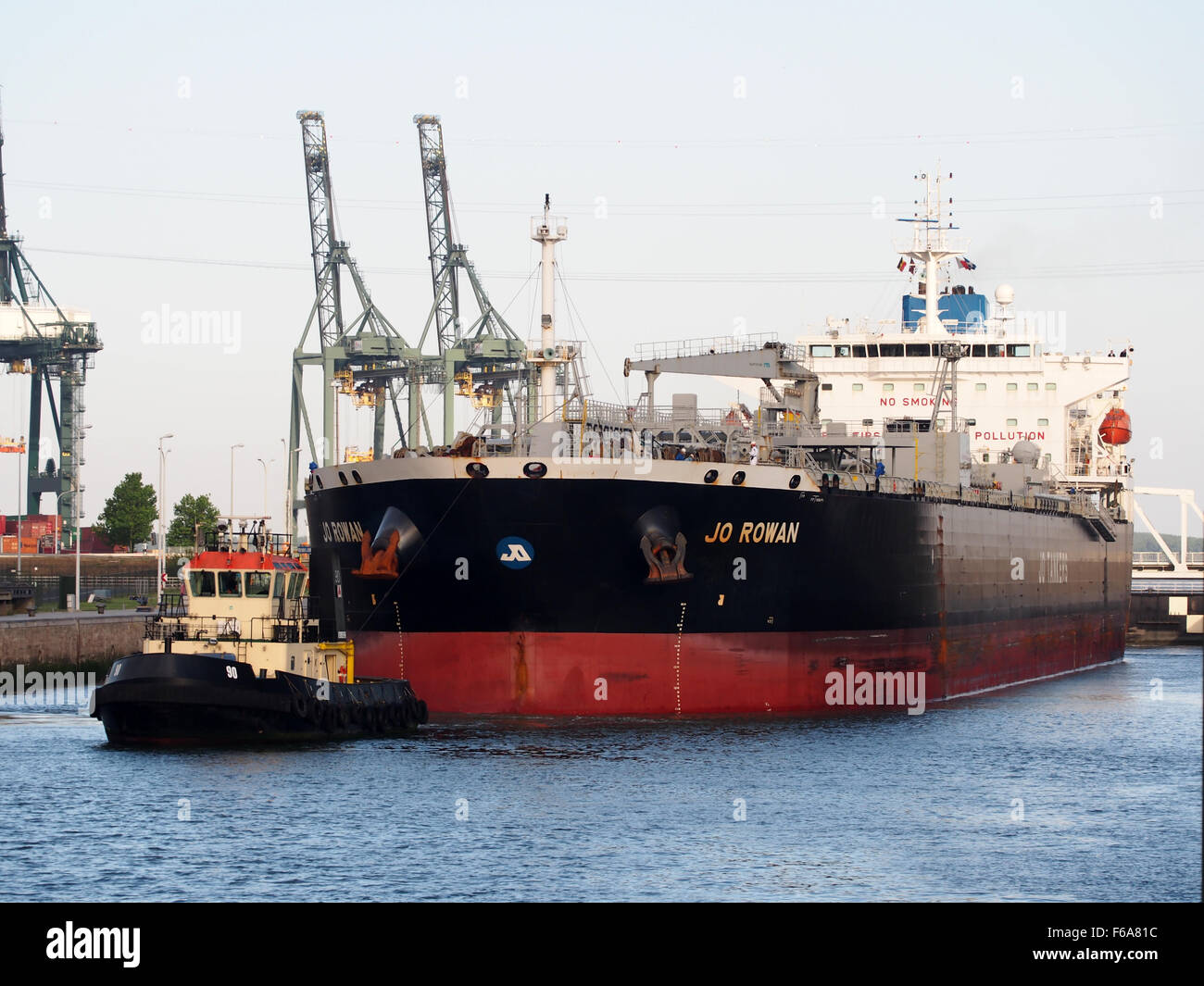 This image captures the IMO 9602710, a large container ship navigating ...