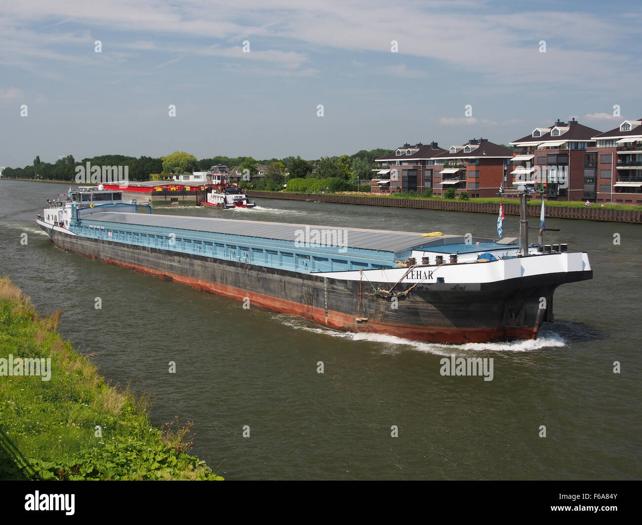 *Lehar*, an oil tanker and container ship, is shown navigating the ...
