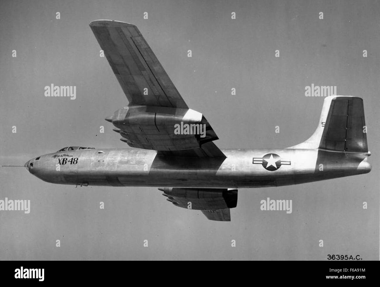 The XB-48, Boeing's experimental jet bomber, shown from below in flight ...