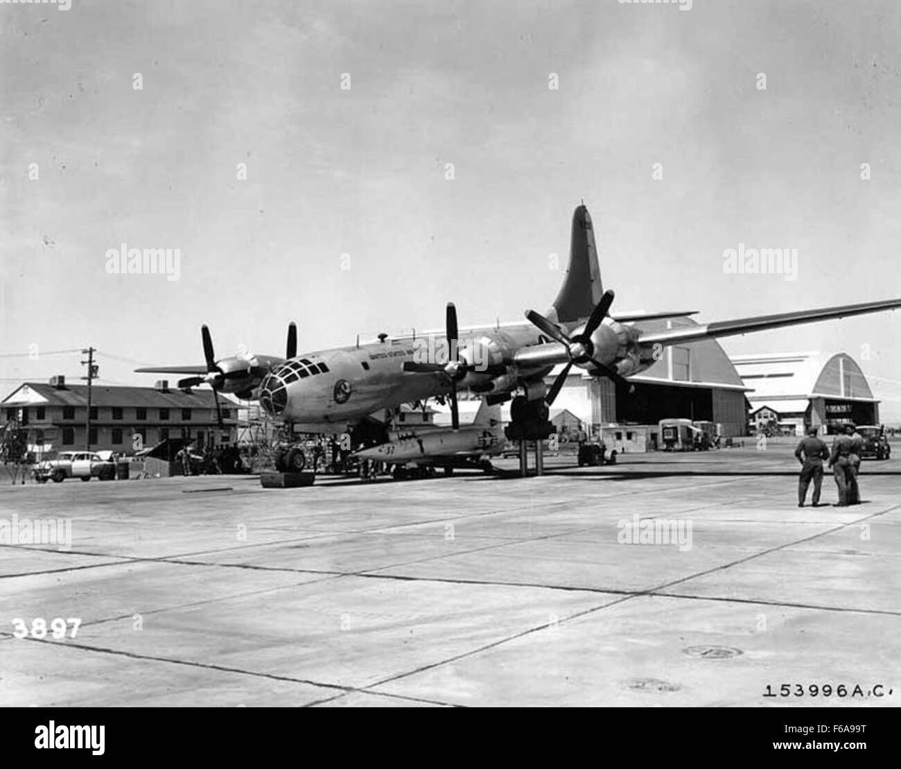 B-50 bomber with X-2 aircraft in tow during a flight test. The B-50 was ...