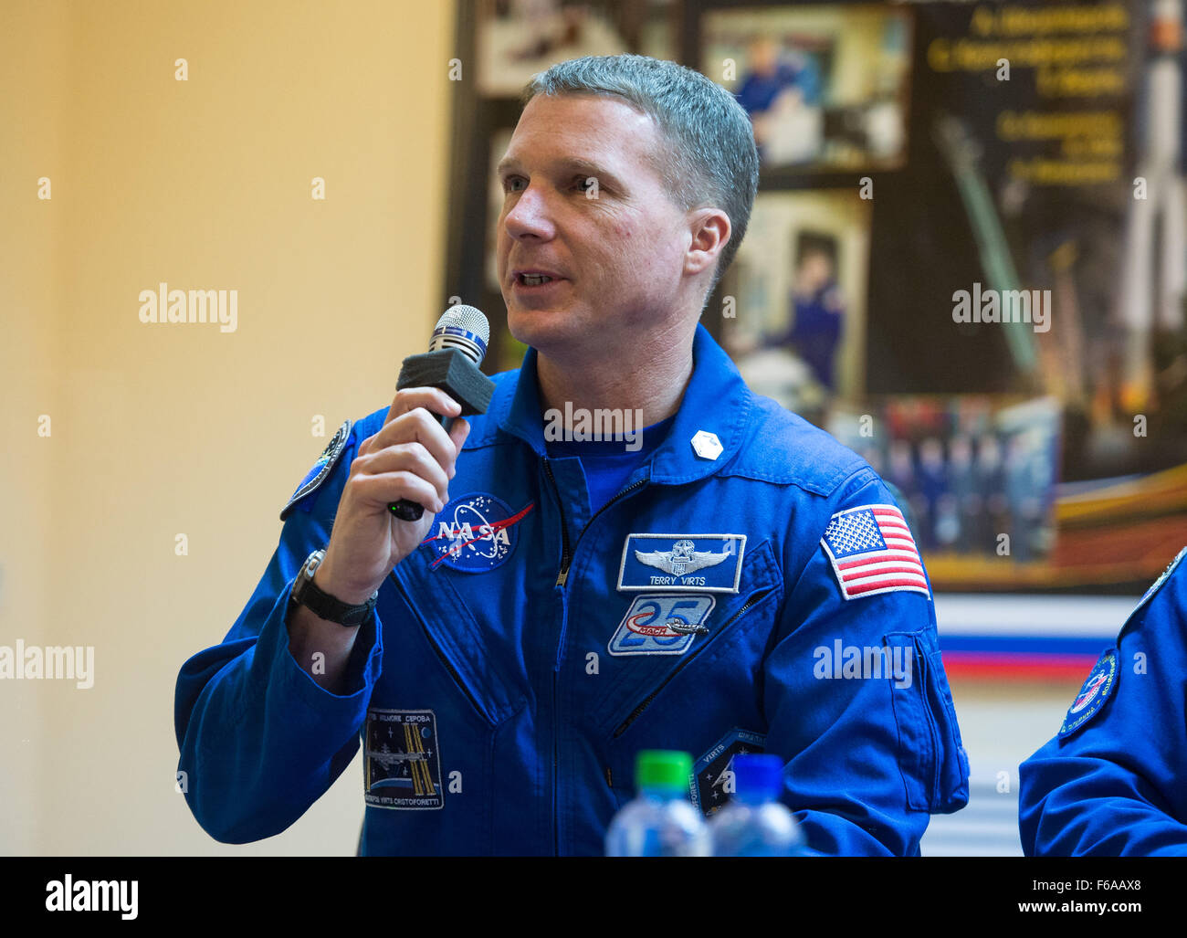 Expedition 42 Flight Engineer Terry Virts of NASA answers a question ...