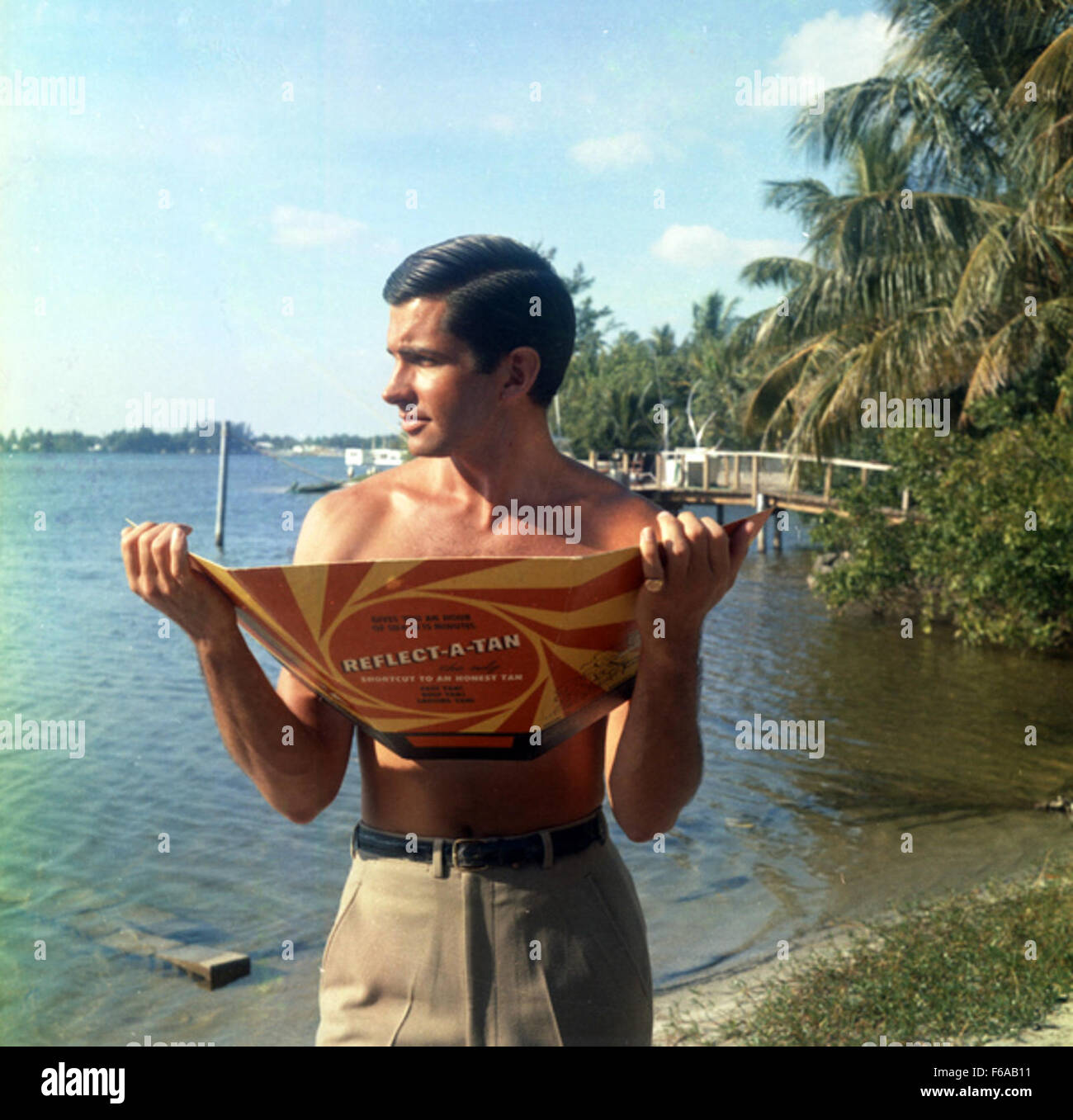 Actor George Hamilton posing with the Reflect-A-Tan in Palm Beach Stock ...