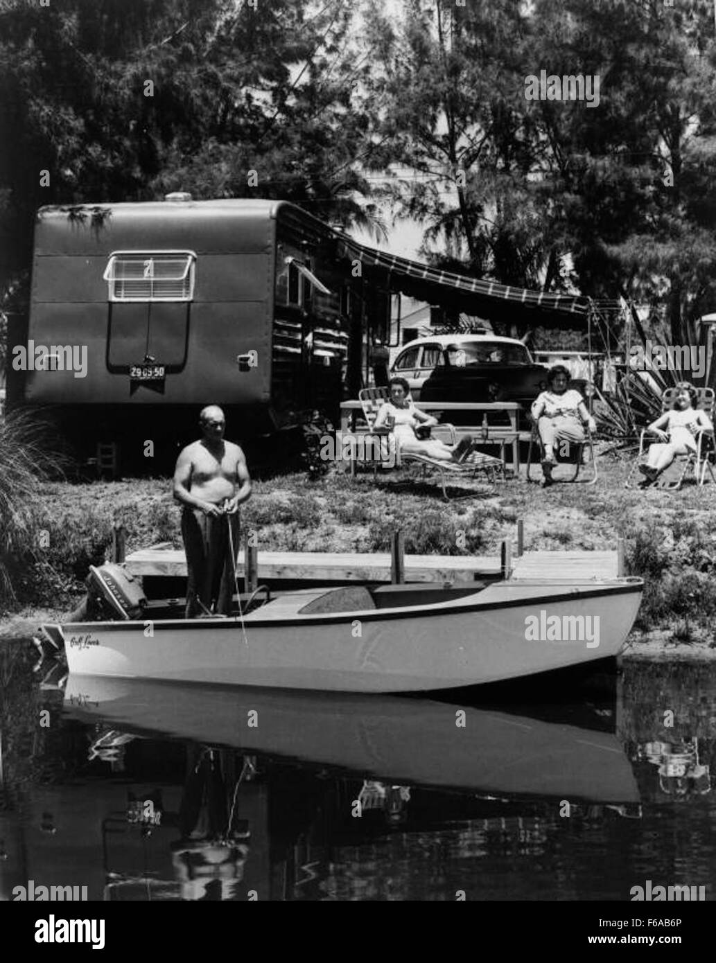 Trailer in the water Black and White Stock Photos & Images - Alamy
