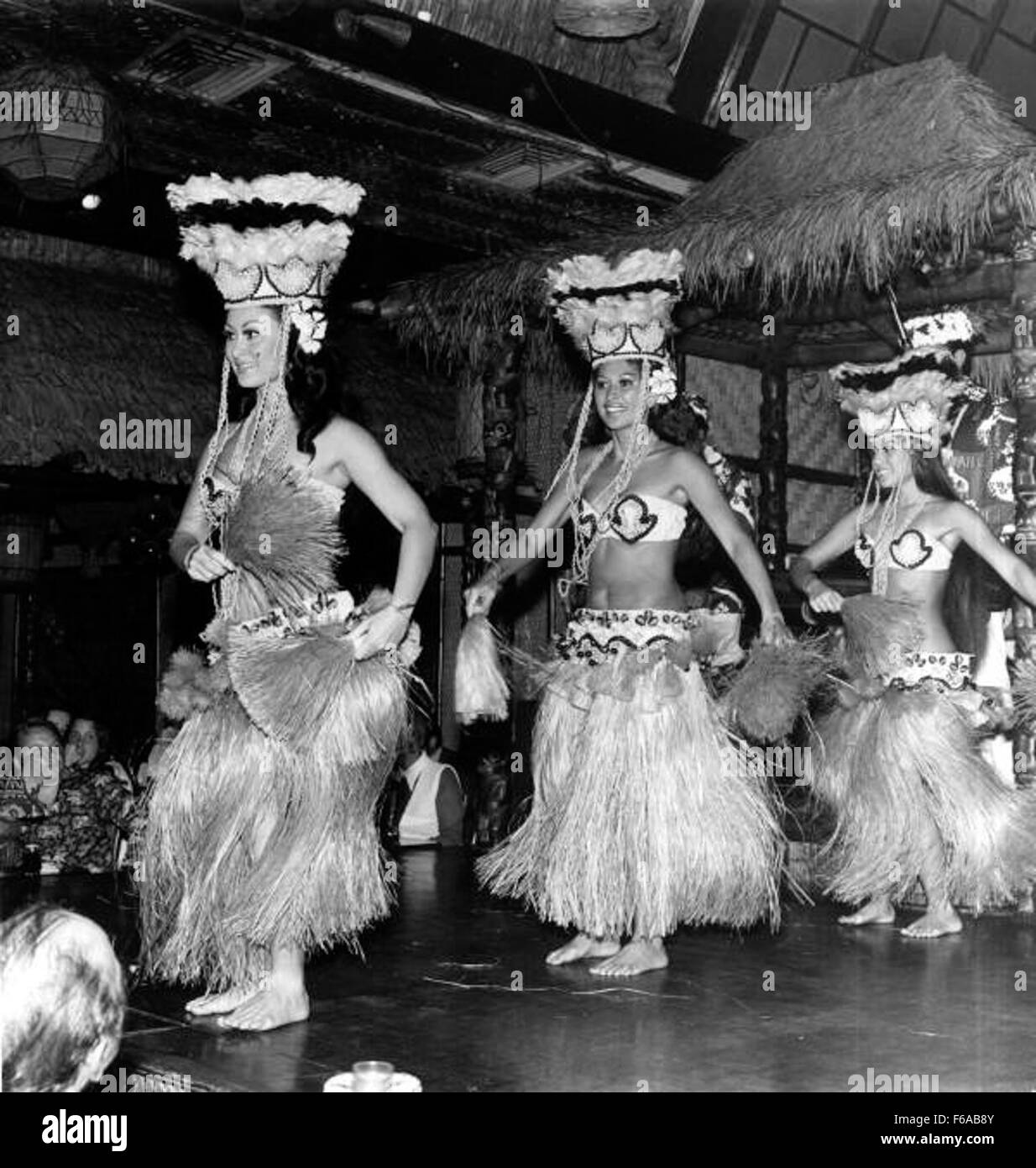 This photograph features Polynesian dancers performing at the Mai-Kai ...
