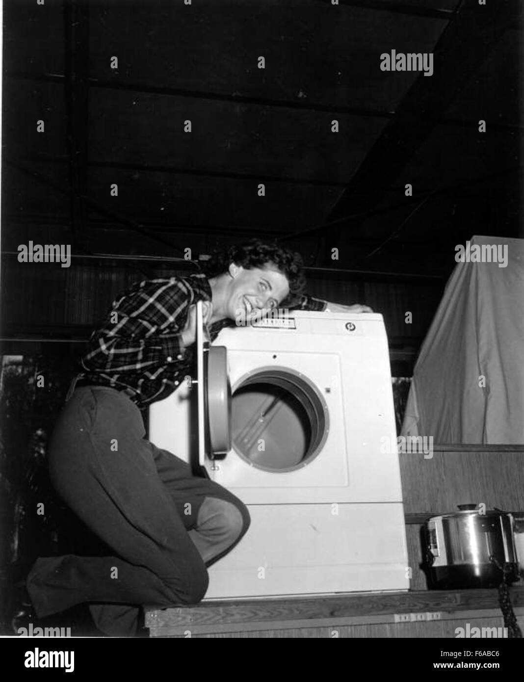 A photograph of a woman posing with a dryer in Orange County, likely ...