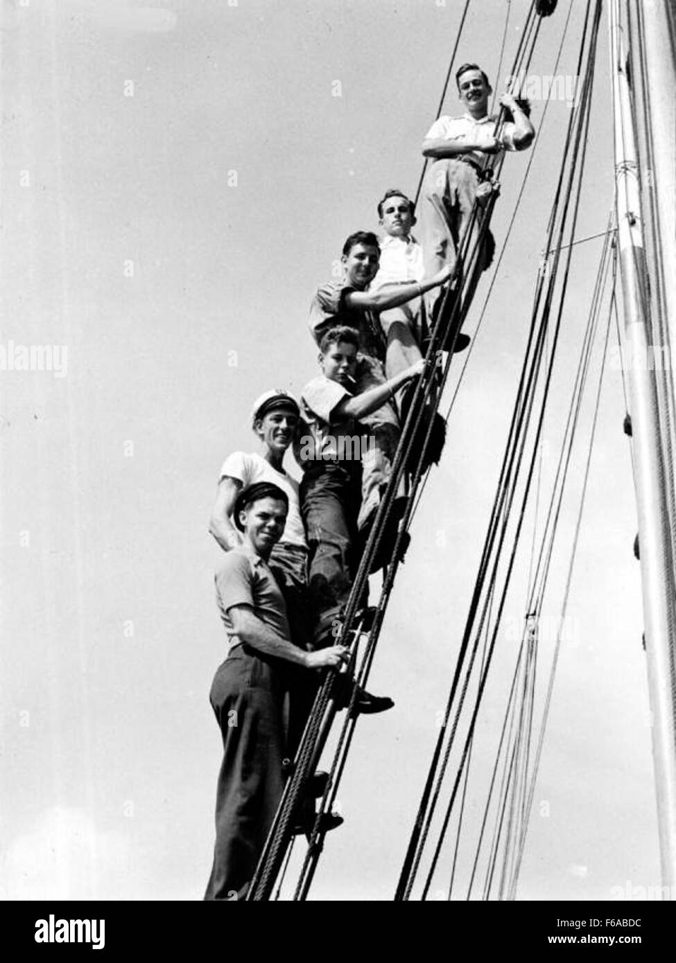Crew members of the *Nor'easter*, a historical vessel, pose on the ...