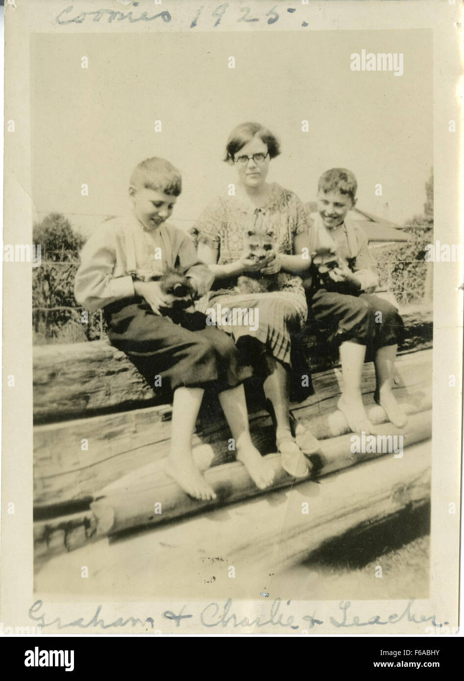 Graham & Charlie & Teacher, 1925 Stock Photo - Alamy
