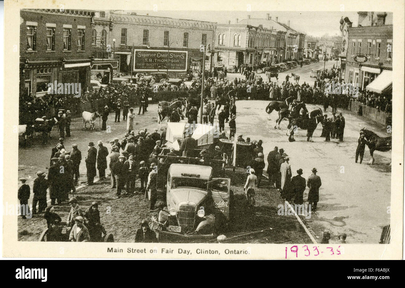 A historic view of Main Street in Clinton, Ontario, during a fair day ...