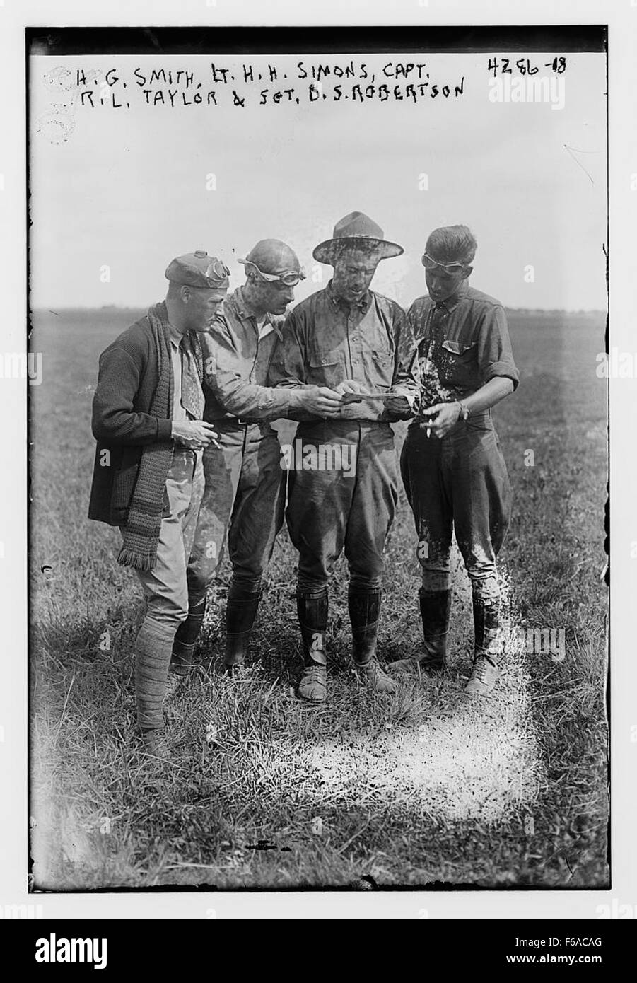 A historical photograph featuring several military personnel, including ...