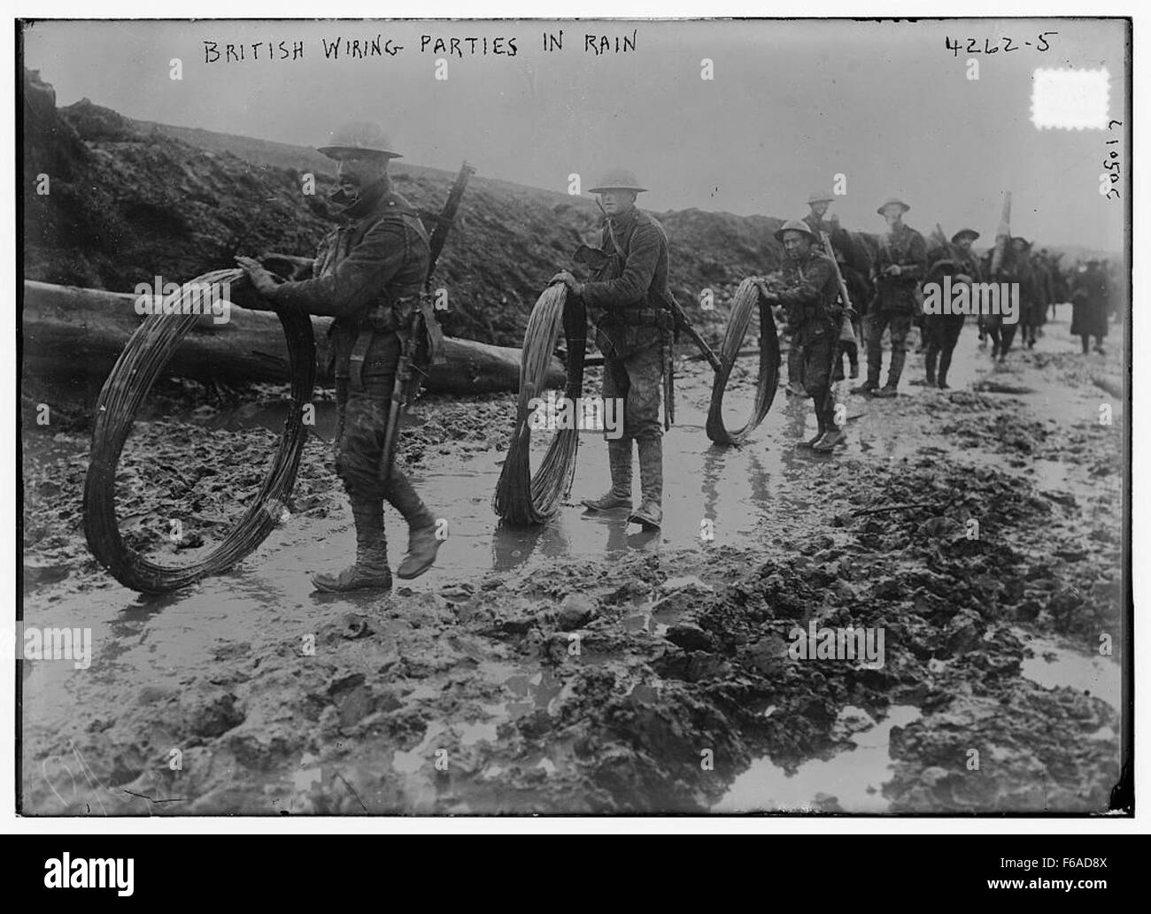 Photograph depicting British soldiers working in rain during World War ...