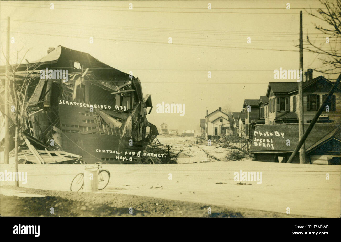 A scene depicting the damage caused by a flood at the intersection of ...