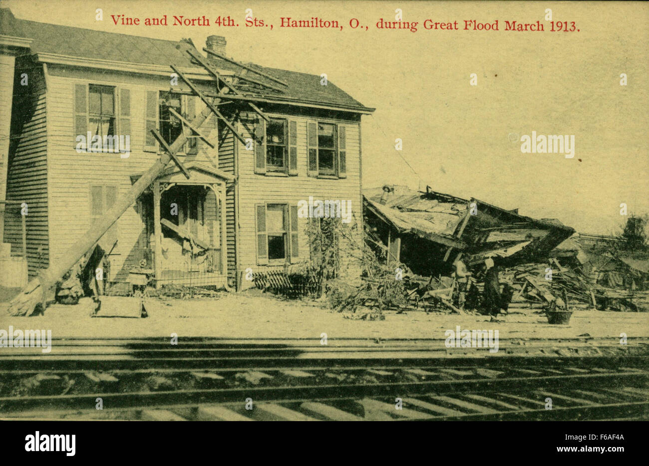 This postcard depicts flood damage in Hamilton, Ohio, capturing the ...