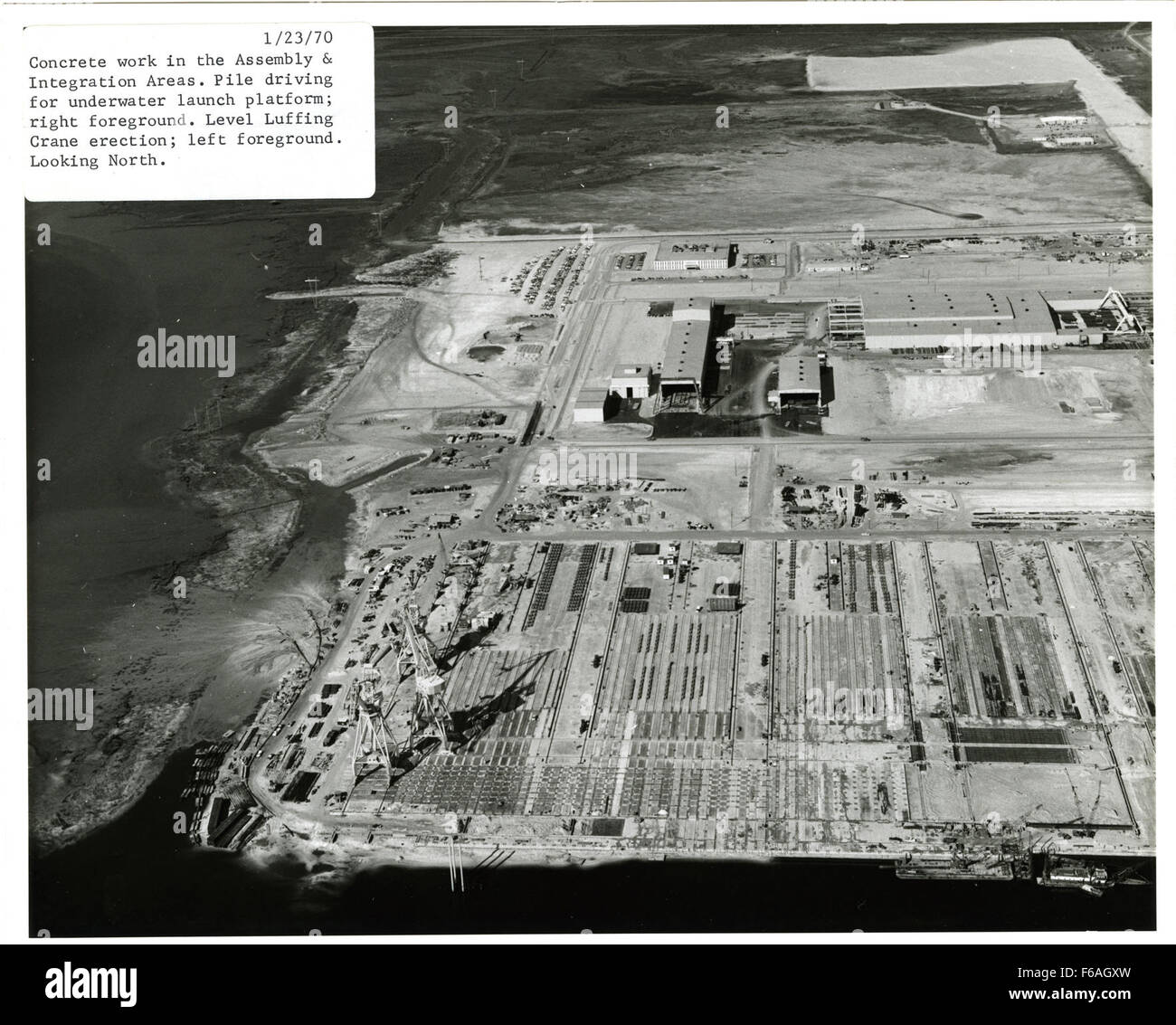 The image shows concrete work and pile driving activities in assembly ...