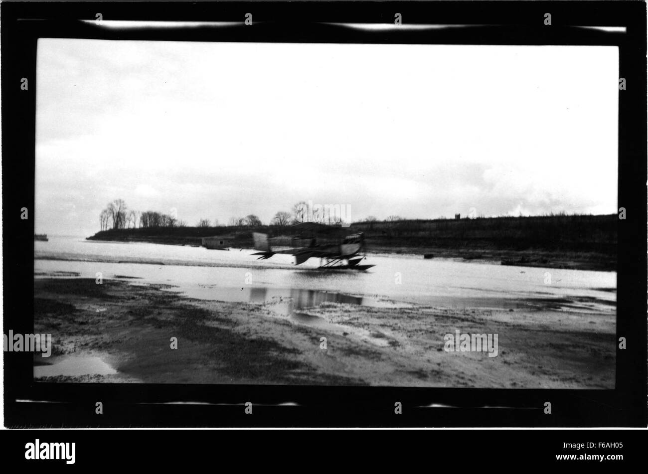 This image depicts an early flying machine, likely from the late 19th ...