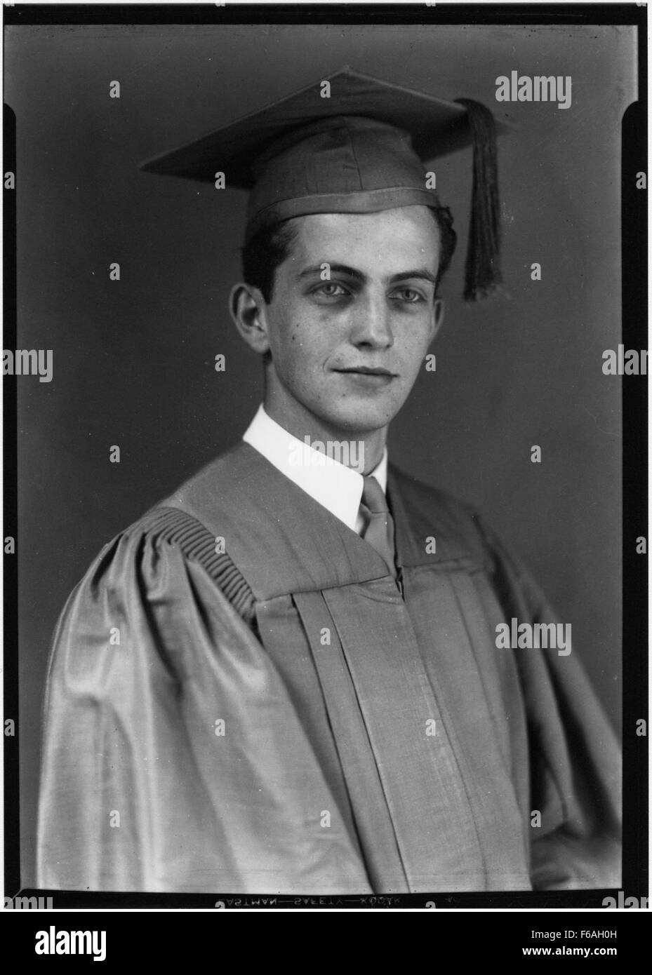 A formal graduation portrait, capturing the significance of academic ...