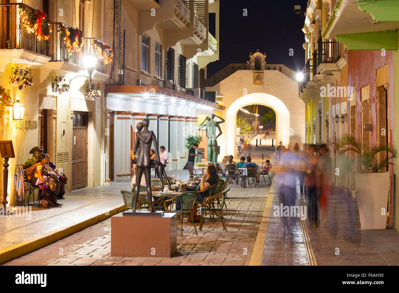 Night scene of outdoor cafes and street strollers in Campeche, Mexico ...