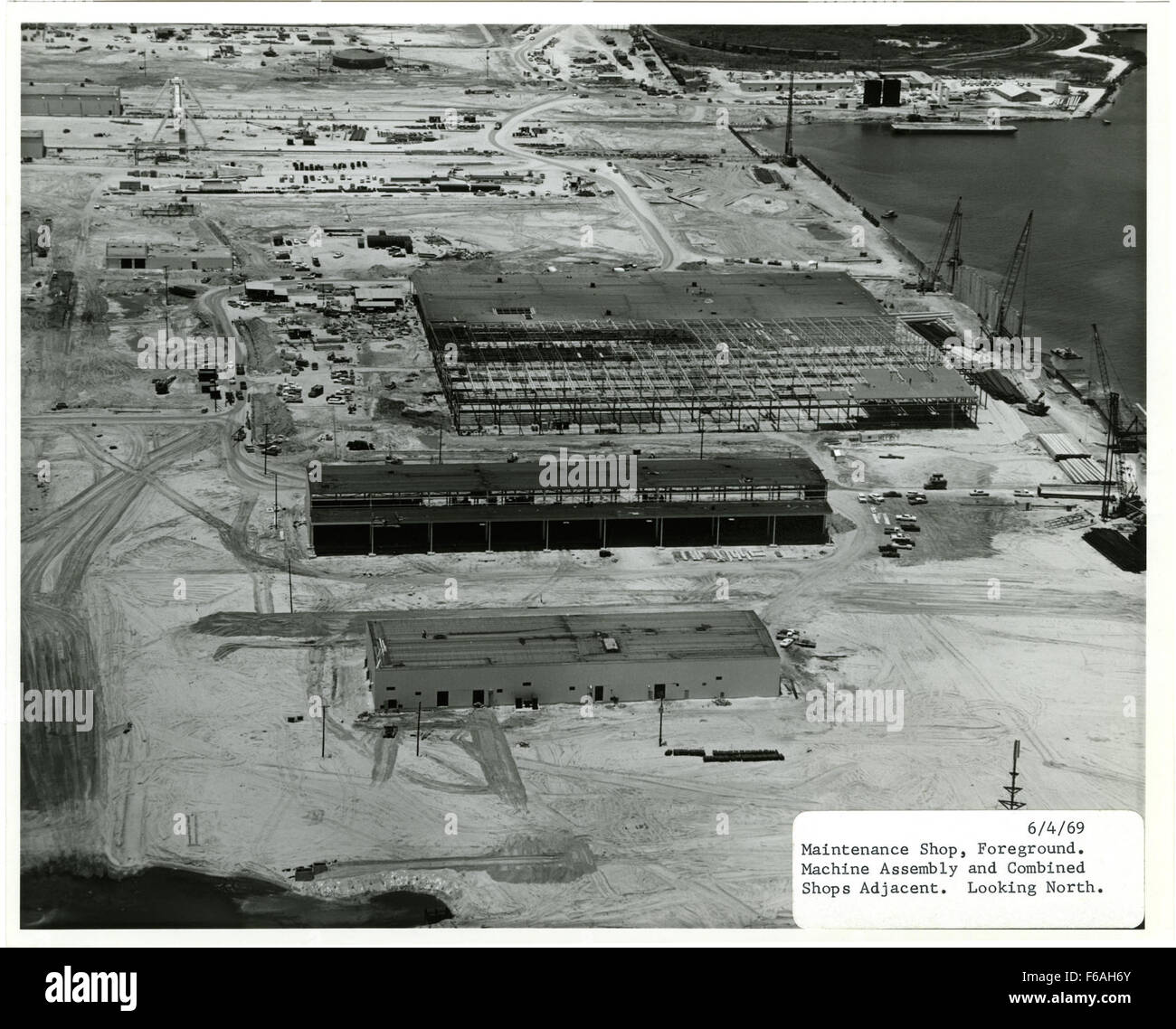 This image captures a maintenance shop with a focus on machine assembly ...