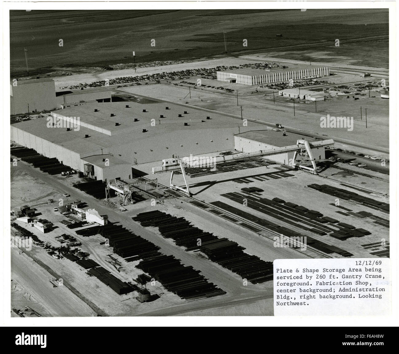 A plate and shape storage area being serviced by a 260-foot crane or ...