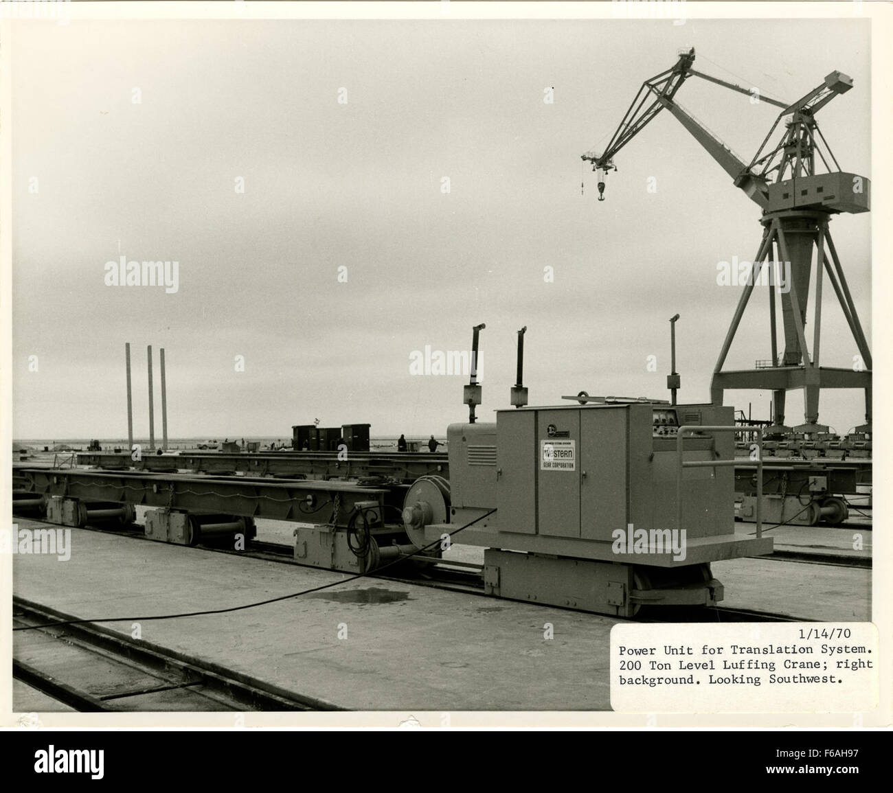 Description of a power unit for a 200-ton level luffing crane, used in ...