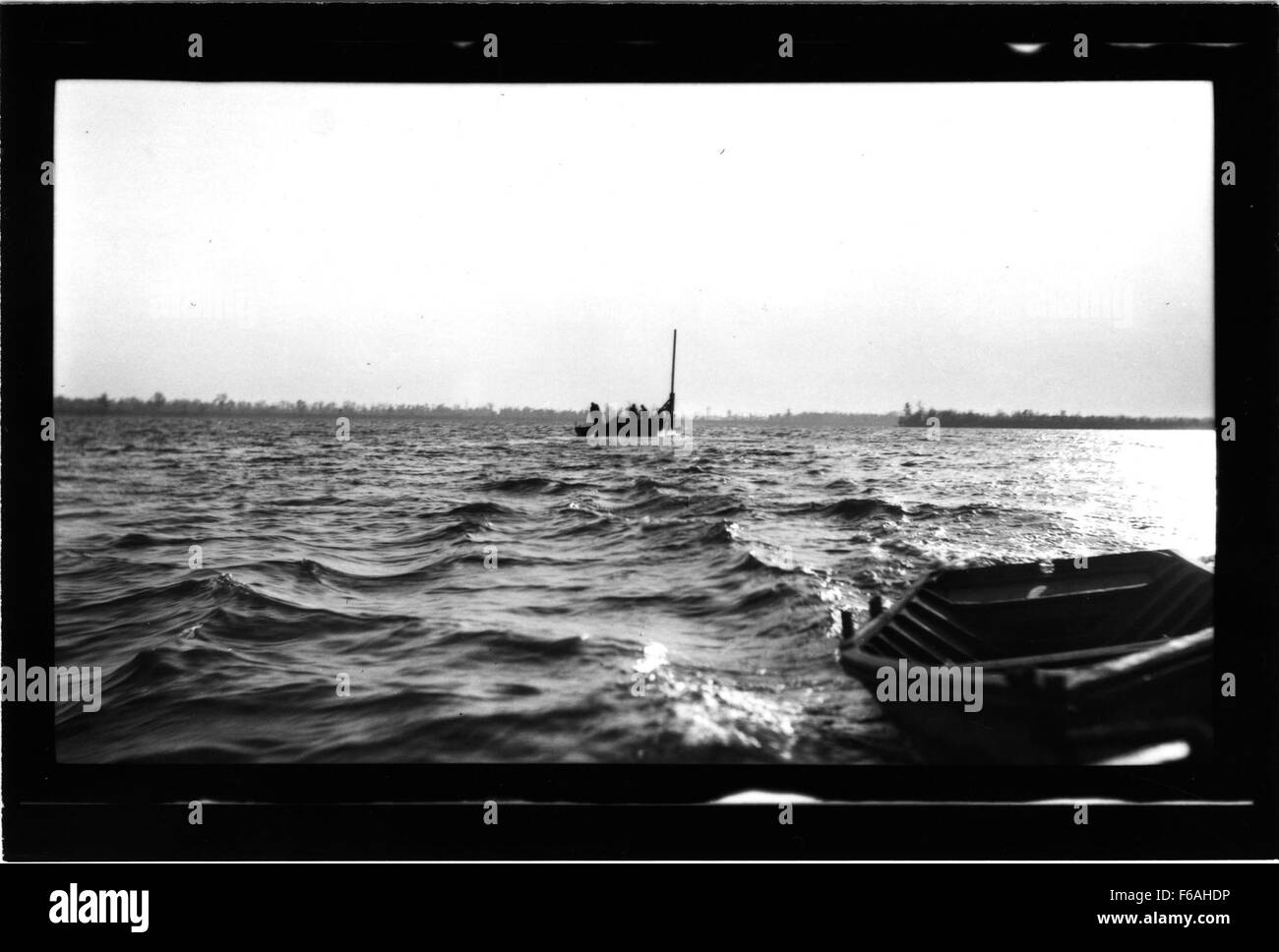 A photograph of seining, a method of fishing, on Moon Lake, McGee. The ...